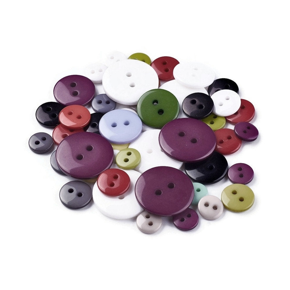 Resin and plastic sewing buttons